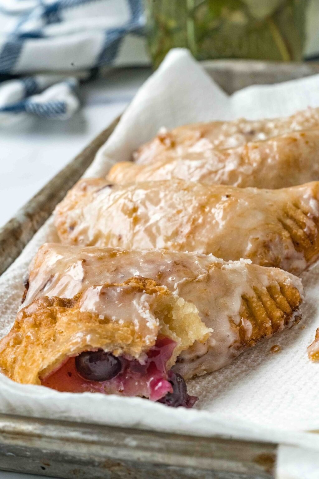 Blueberry Hand Pies with Flaky Crust and Vanilla Glaze